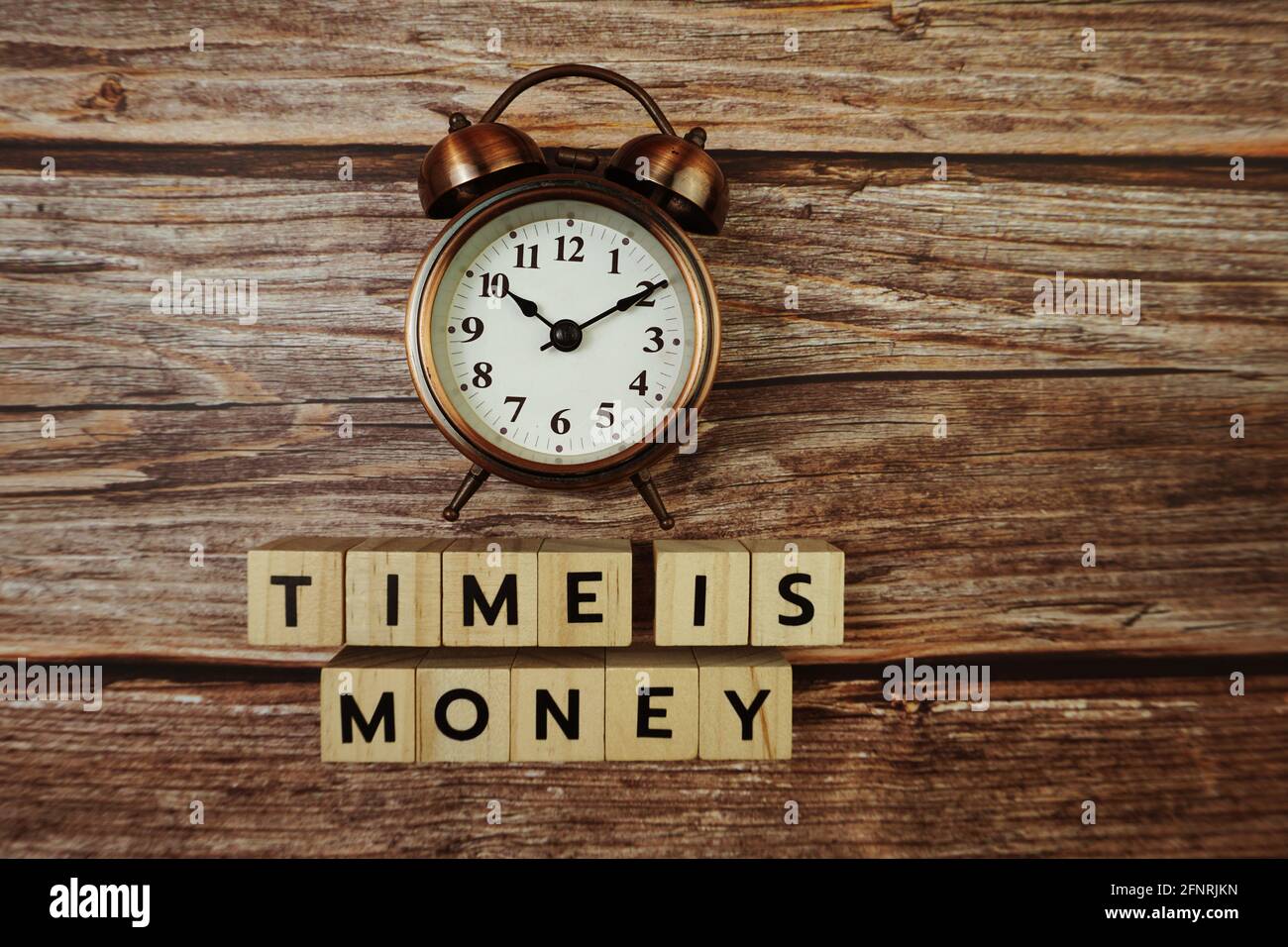 Time Is Money Word alphabet letters on wooden background Stock Photo ...