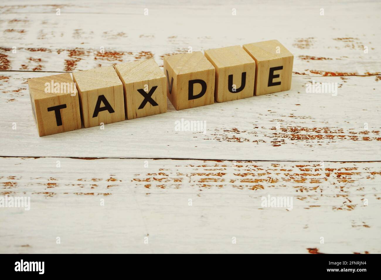 Tax Due Word alphabet letters on wooden background Stock Photo - Alamy