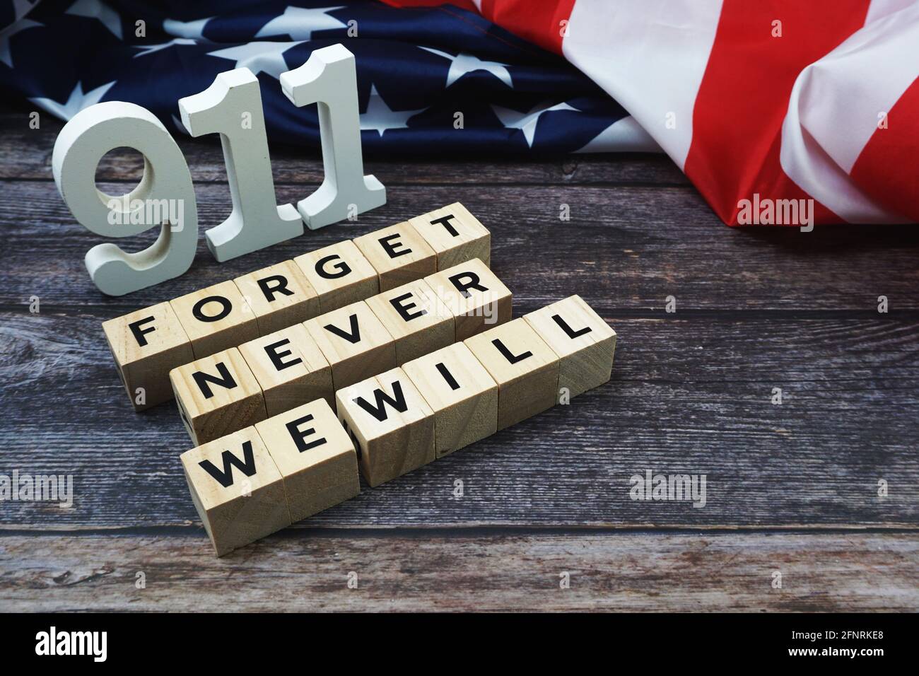 911 We will Never Forget Word alphabet letters on wooden background ...