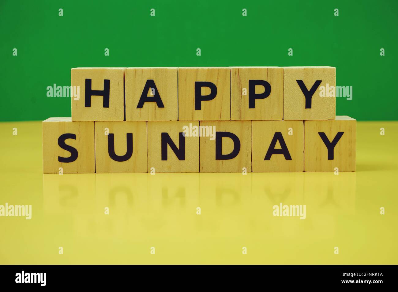 Happy Sunday alphabet letter on green and yellow background Stock Photo ...