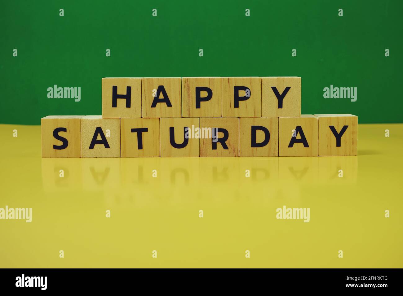 Happy Saturday alphabet letter on green and yellow background Stock ...