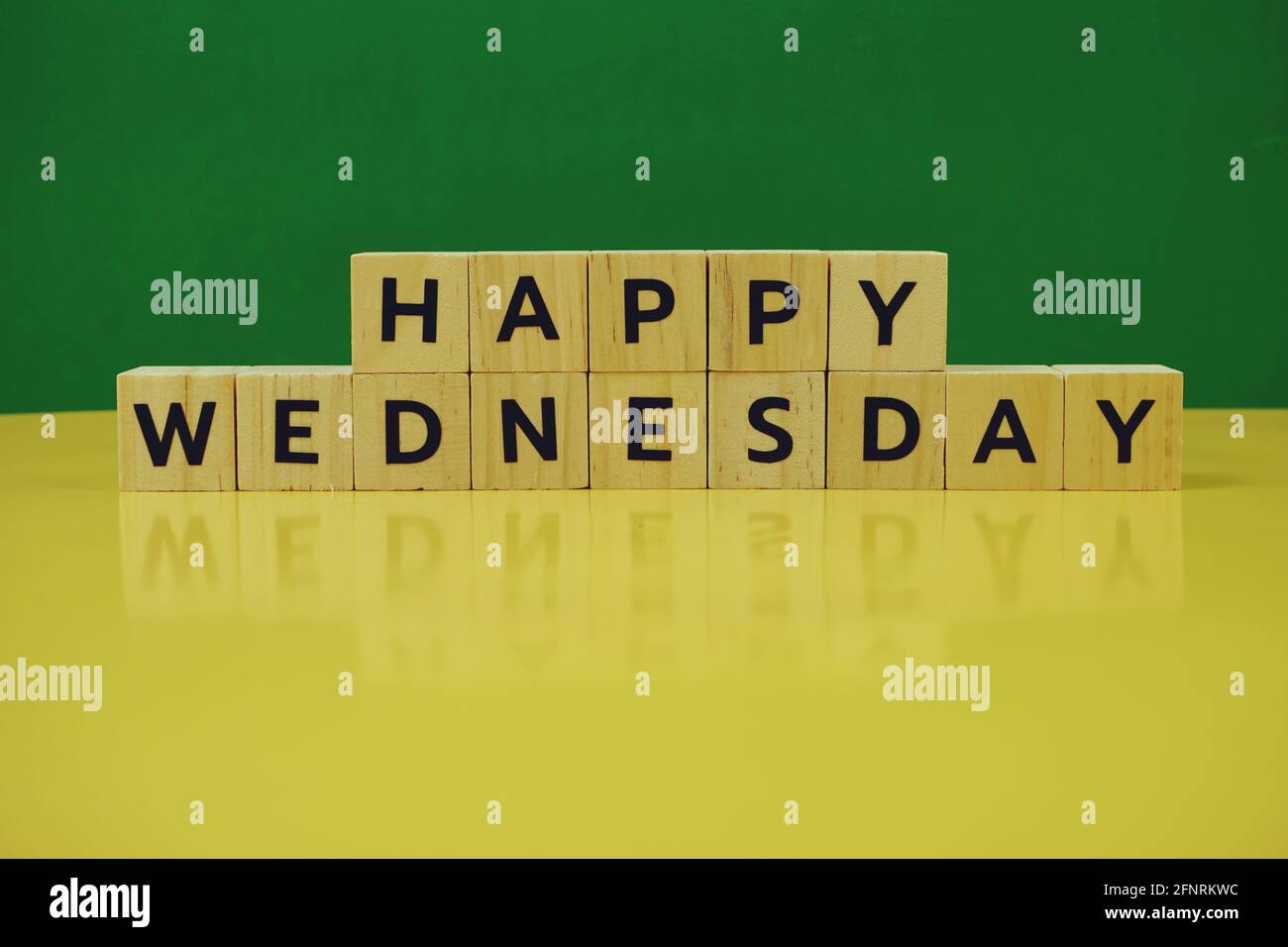 Happy Wednesday alphabet letter on green and yellow background Stock ...