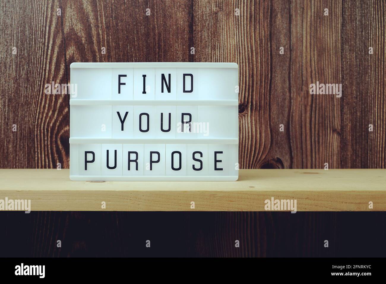 Find Your Purpose word in light box on wooden background Stock Photo ...