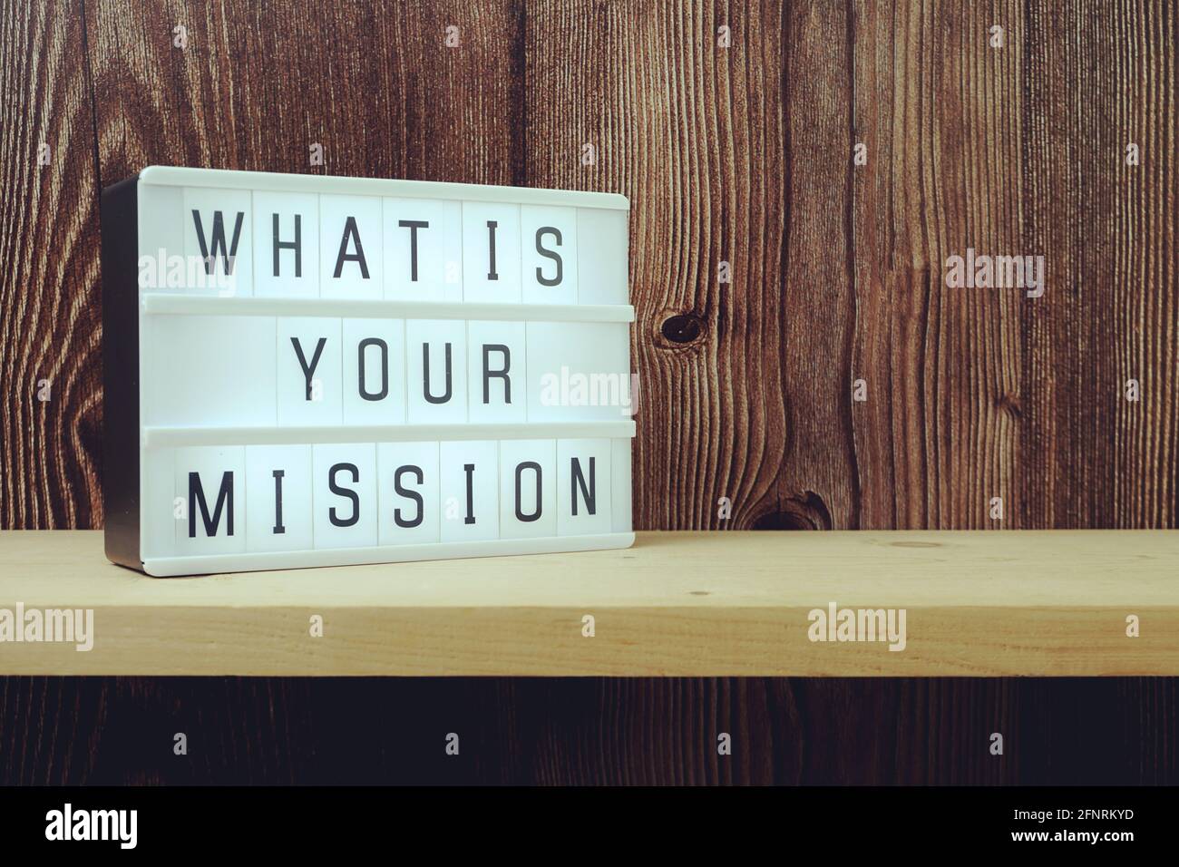What is your Mission word in light box on wooden background Stock Photo ...