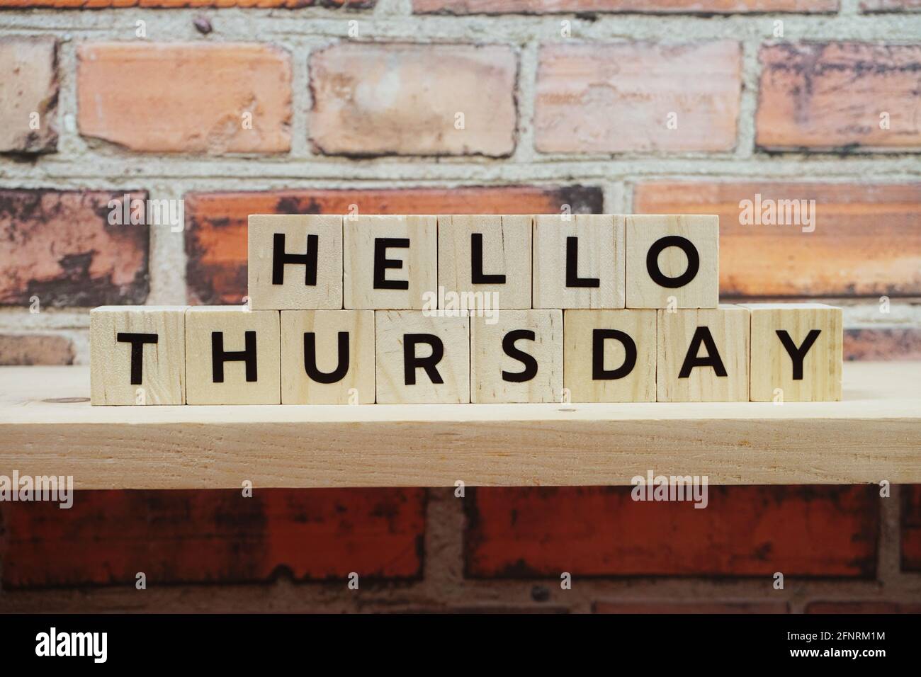 Happy Thursday alphabet letter on shelves wooden background Stock Photo ...