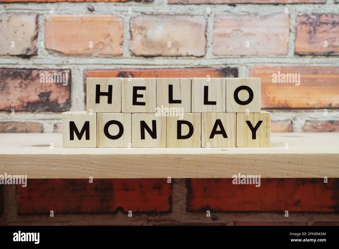 Happy Monday alphabet letter on shelves wooden background Stock Photo ...