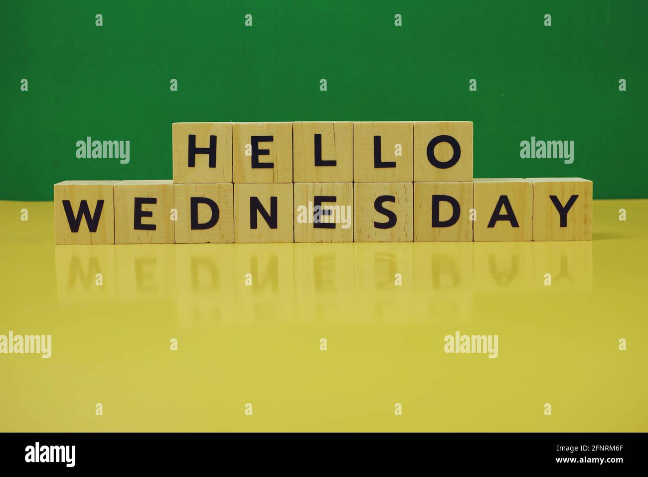 Happy Wednesday alphabet letter on green and yellow background Stock ...
