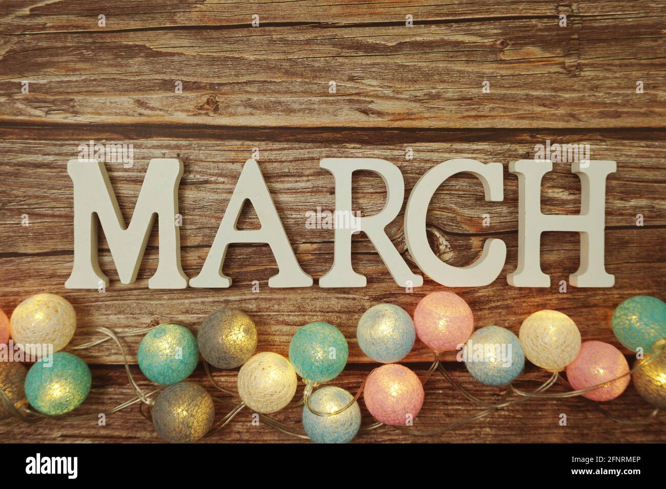 March alphabet letter with LED Cotton ball Decoration on wooden ...