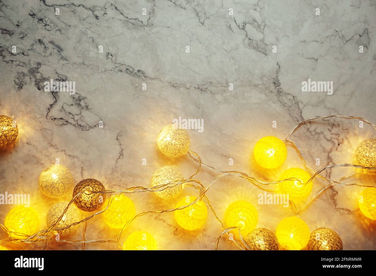 Colorful LED cotton ball decorative on woode background Stock Photo - Alamy