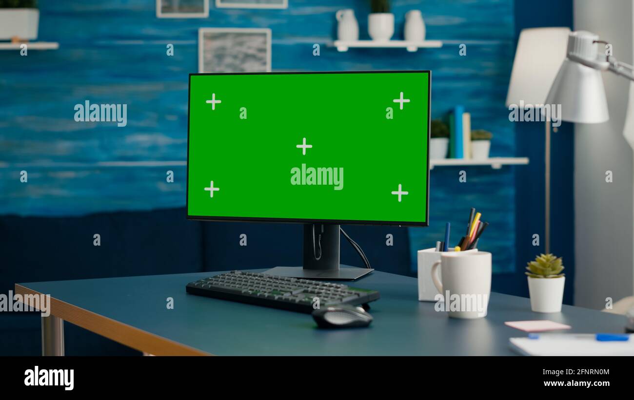Modern computer with mock up green screen chroma key set up for ...