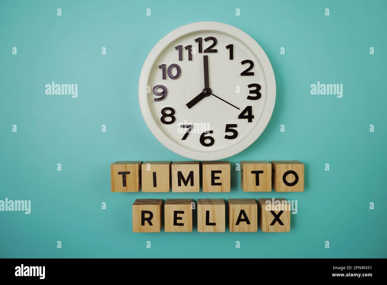 Time To Relax alphabet letter with alarm clock on blue background Stock ...