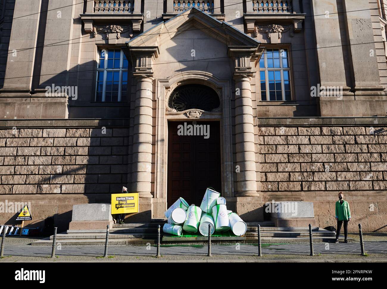 Berlin, Germany. 19th May, 2021. Barrels symbolically painted as poison ...