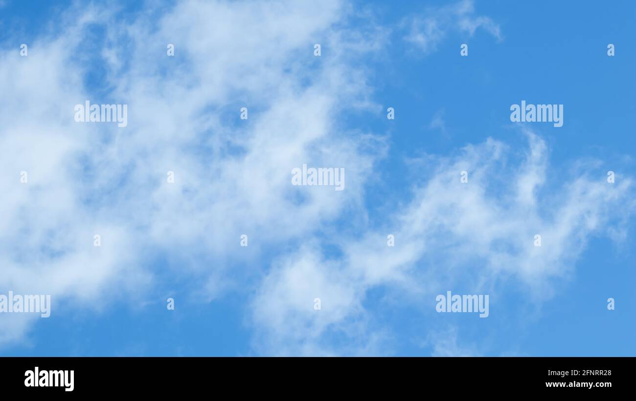 Background of blue sky with white clouds Stock Photo - Alamy