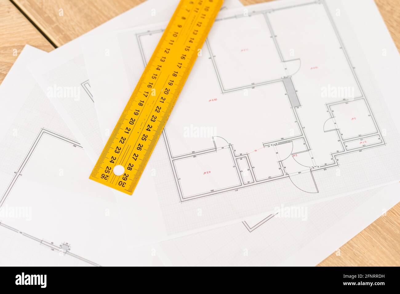 Architect working on blueprint. Architects workplace - architectural ...