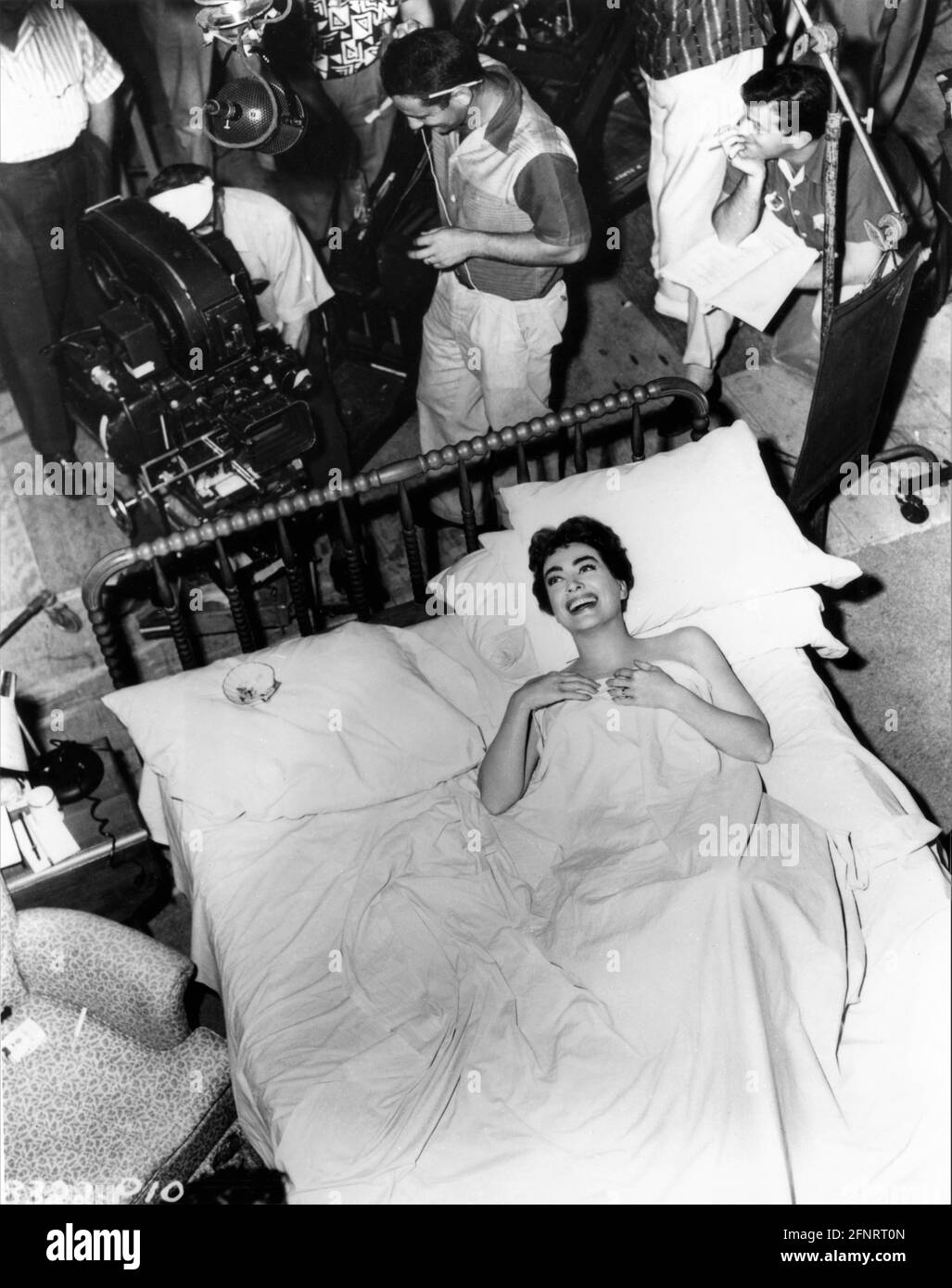 JOAN CRAWFORD candid with Movie Crew during filming of AUTUMN LEAVES ...