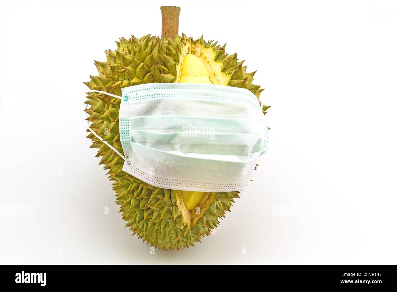 Smelly durian wear mask isolated on white background Stock Photo - Alamy
