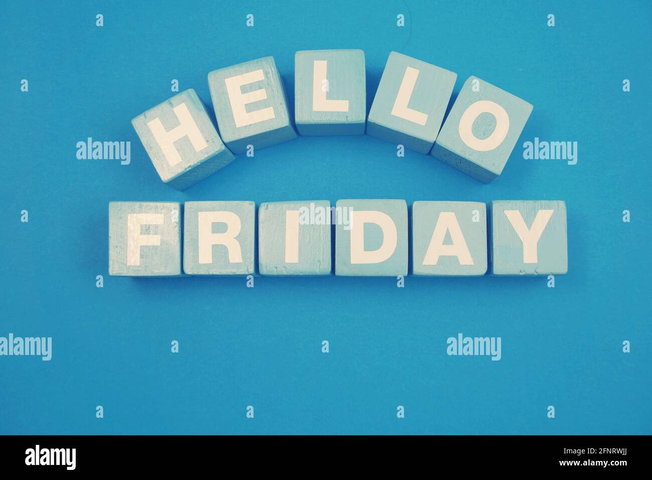 Hello Friday alphabet letters on blue background Stock Photo - Alamy