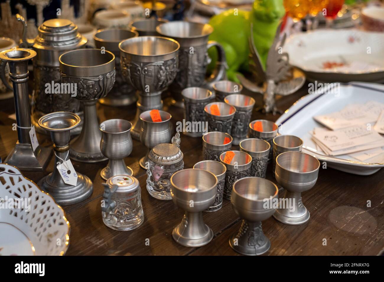 Collection of silver goblets at local market Stock Photo - Alamy