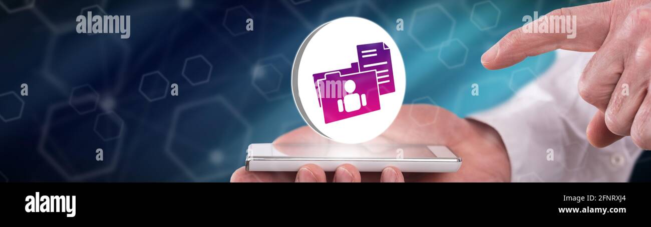 Personal data concept above a smartphone held by a man Stock Photo - Alamy