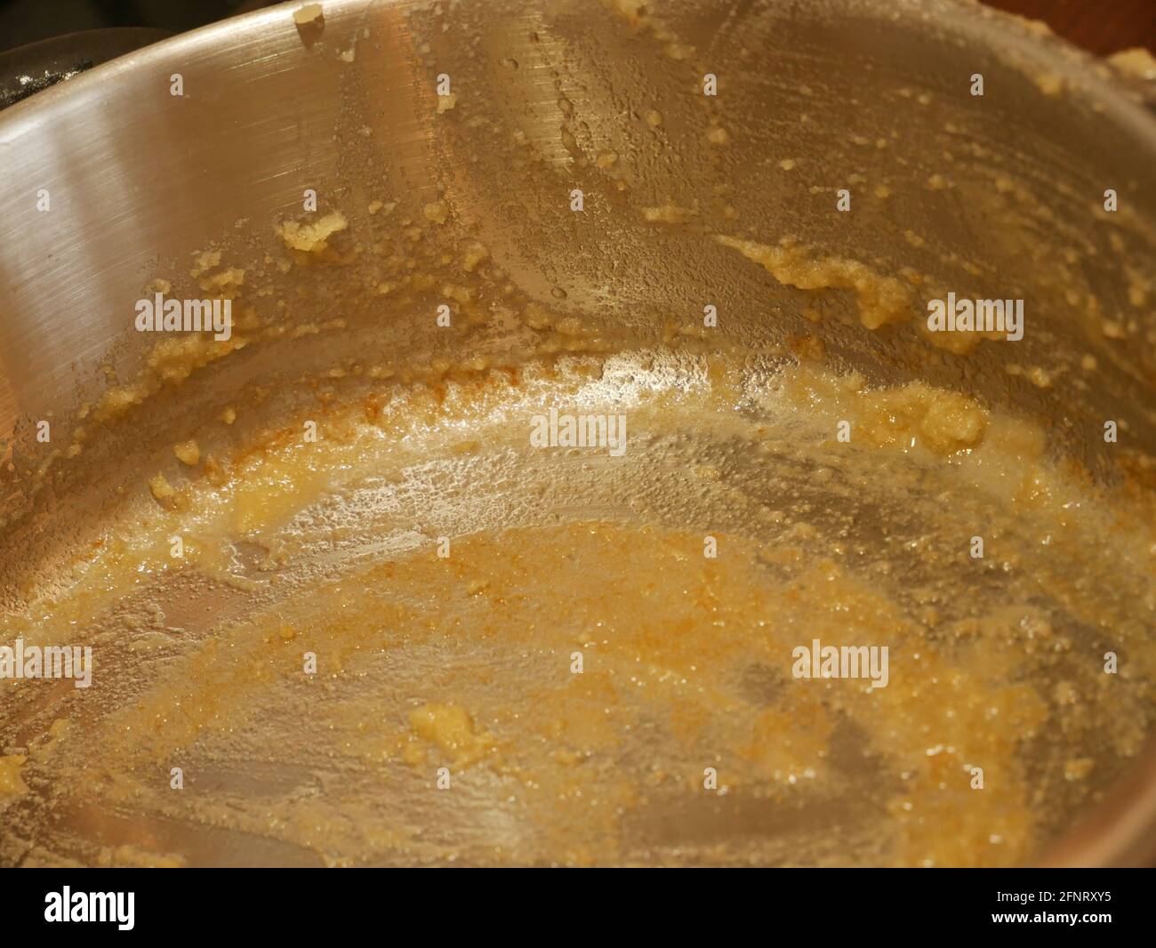 Dirty stainless steel pot Stock Photo - Alamy