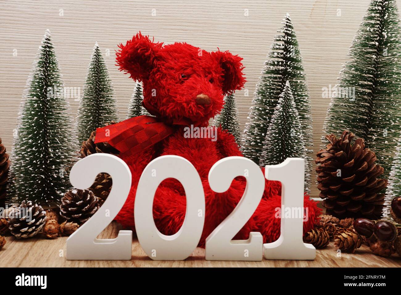 Happy New Year 2021 festive background with christmas tree and teddy ...