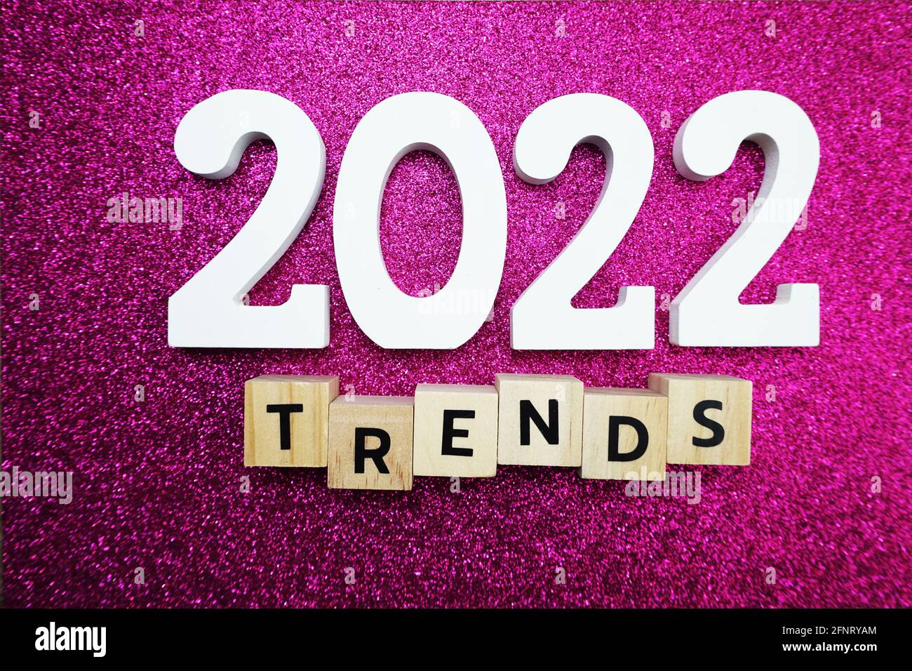 Trends 2022 word alphabet letters on pink glitter background Stock ...