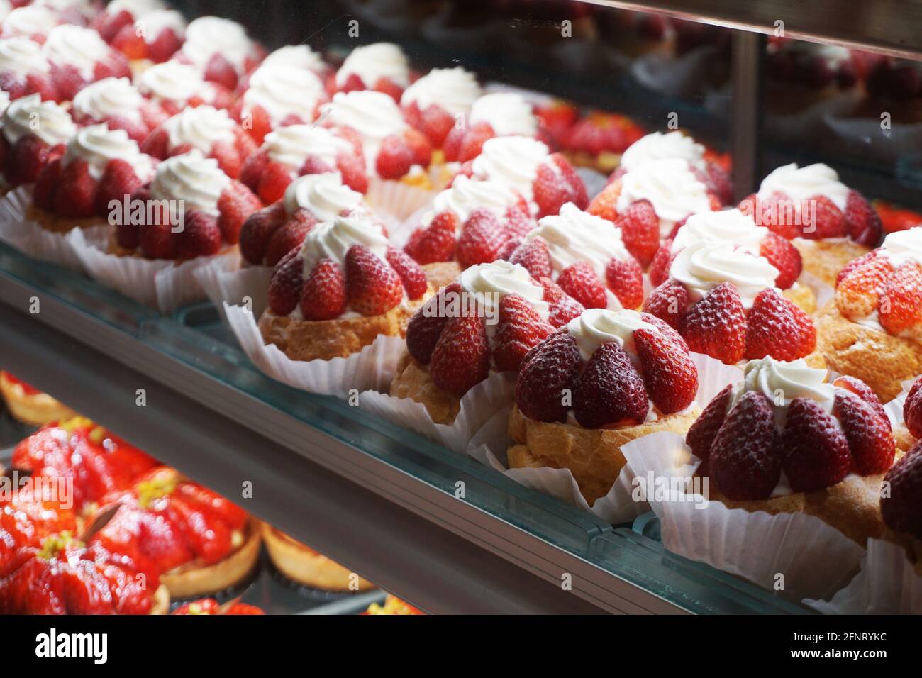 Strawberry Cream Puff in Bakery Shop Stock Photo - Alamy