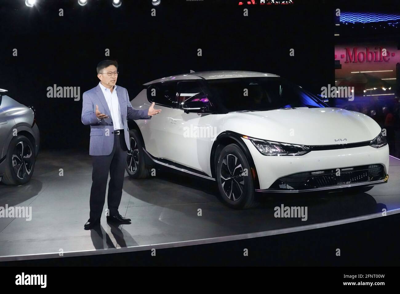 President and CEO Sean Yoon speaks during the unveiling of the new KIA ...