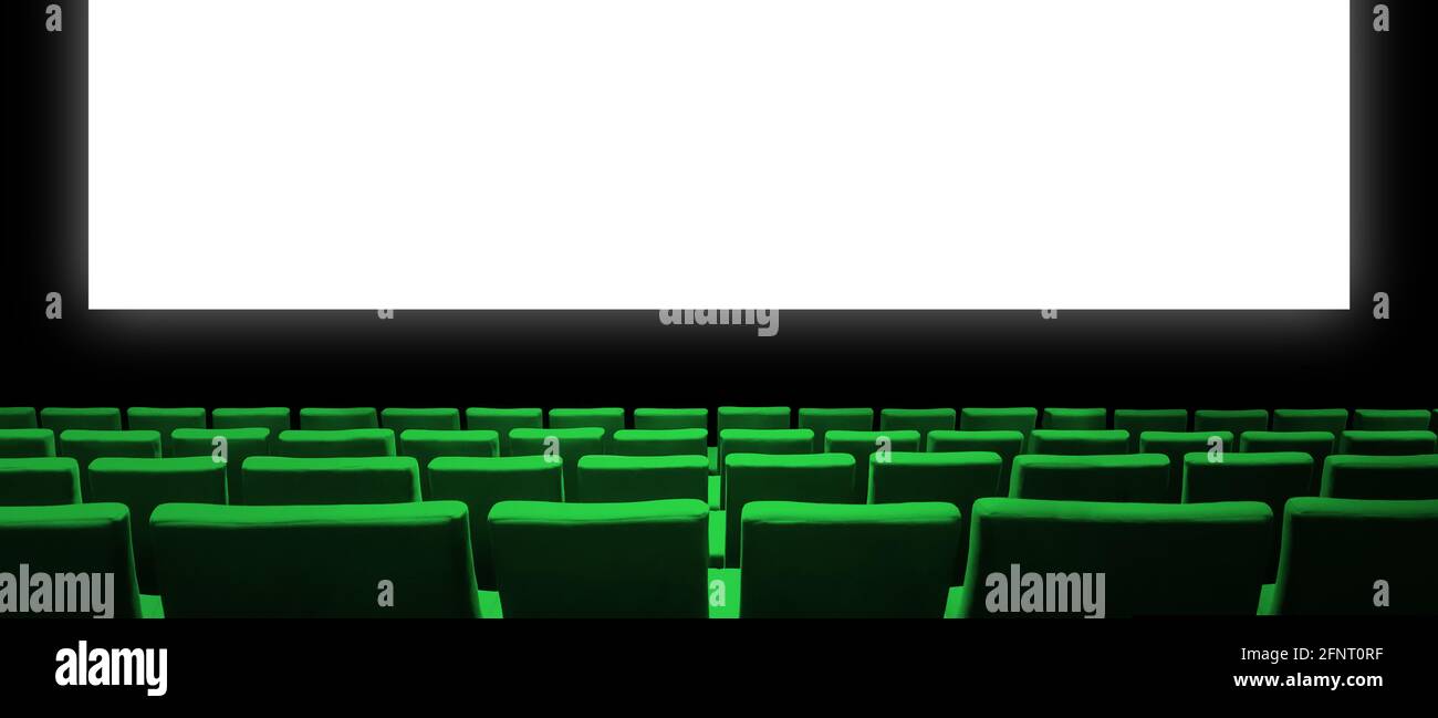 Cinema movie theatre with green velvet seats and a blank white screen ...