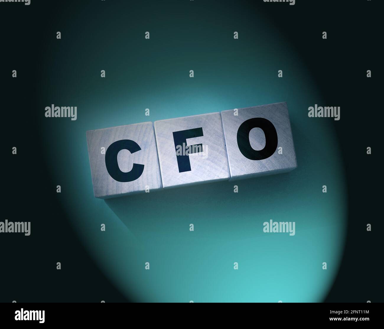 CFO abbreviation on wooden cubes on a red background. Chief Financial ...