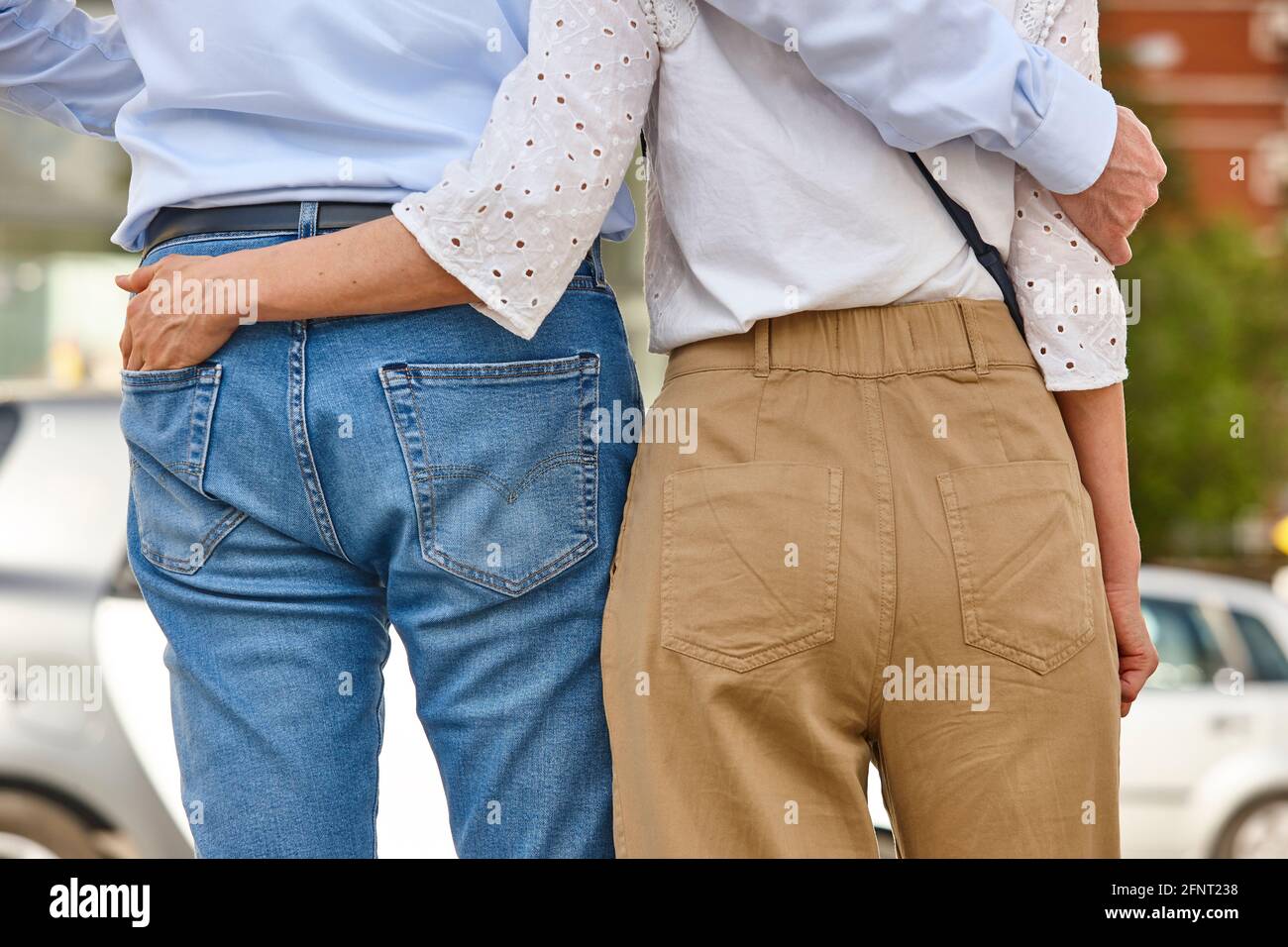 Embracing couple in the city. People in love. Romantic Stock Photo - Alamy