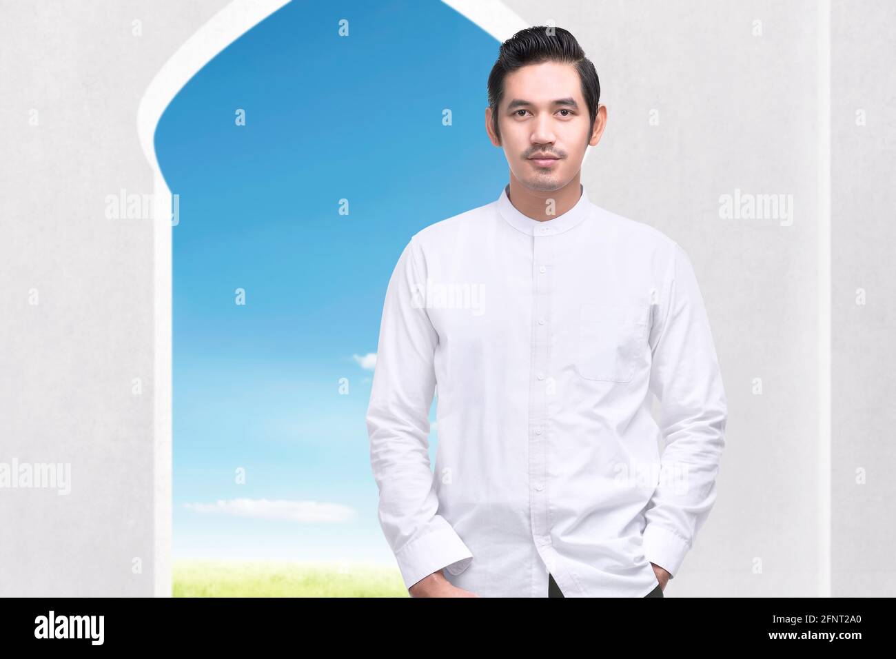 Asian Muslim man standing in the mosque Stock Photo - Alamy