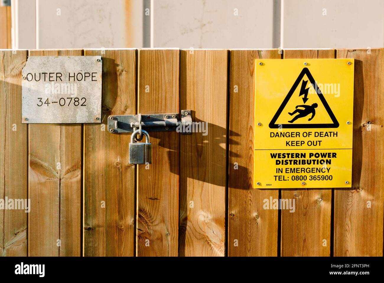 A yellow Danger of Death warning sign in Outer Hope, Devon, UK Stock ...