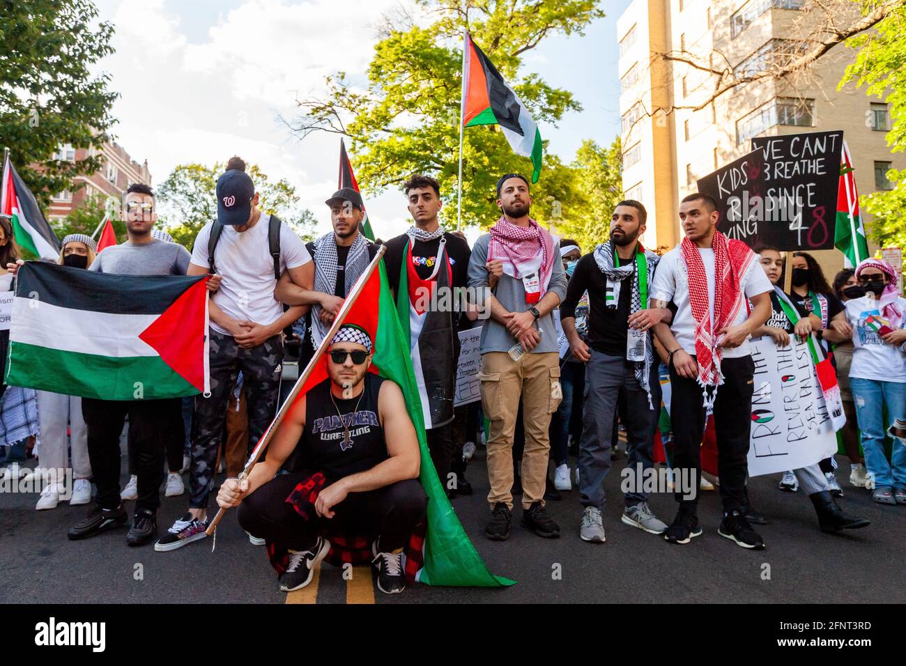 Washington, DC, USA, 18 May, 2021. Pictured: Young men with Palestinian ...