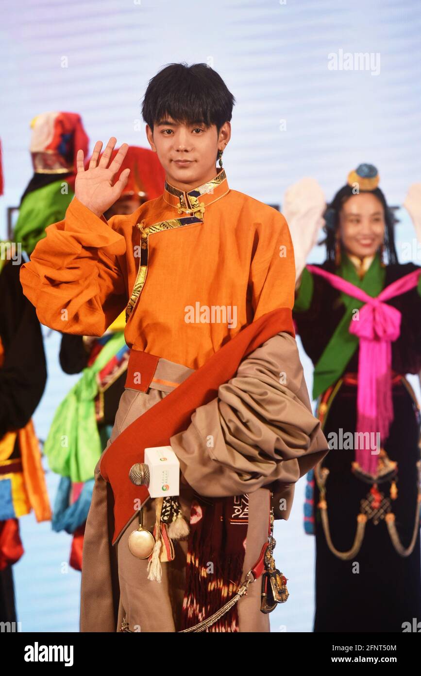 HANGZHOU, CHINA - MAY 19, 2021 - Ding Zhen, dressed in a traditional Tibetan robe, appears at an ...