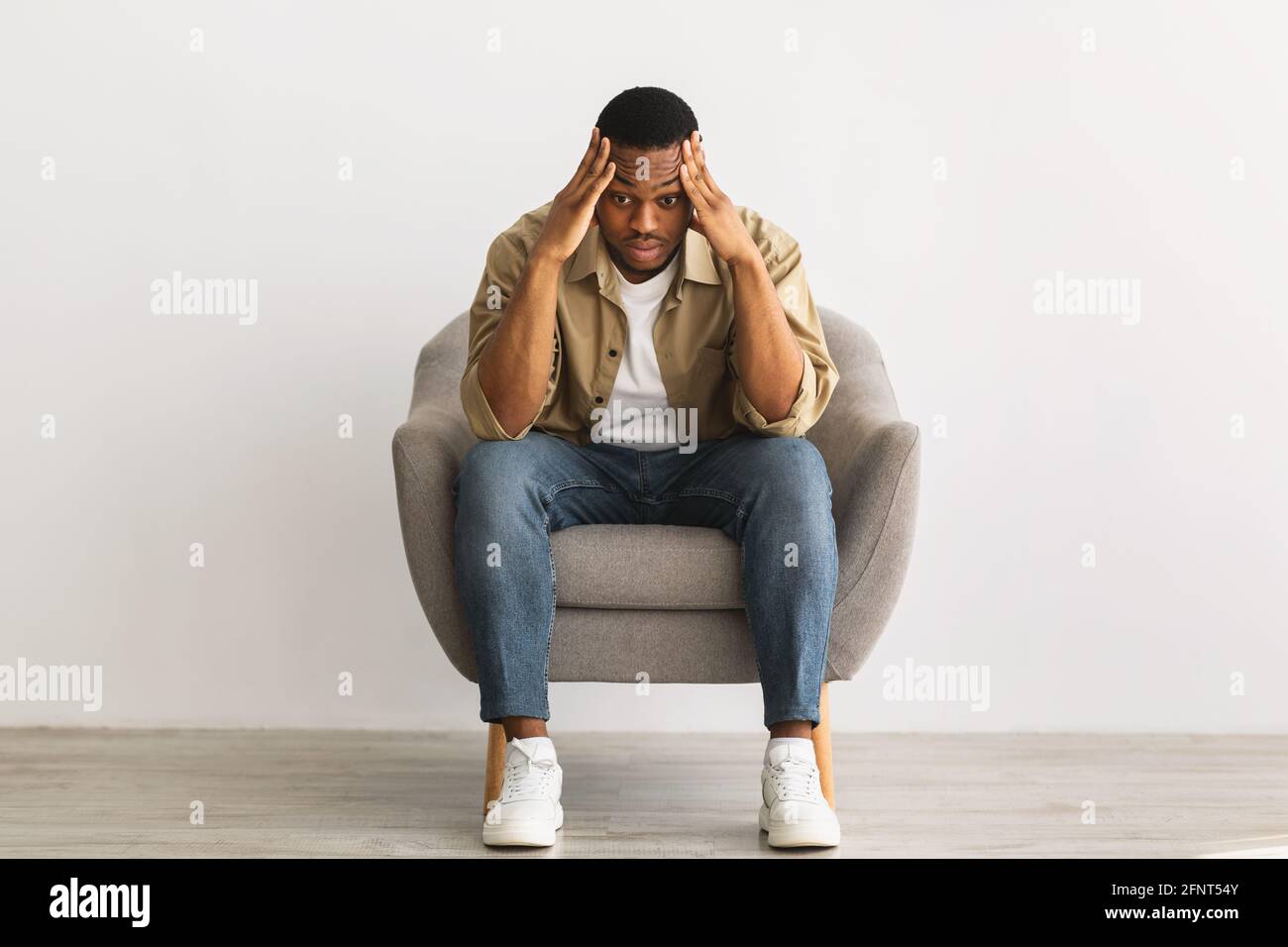 Concerned African American Guy Thinking Worrying About Problems, Gray ...
