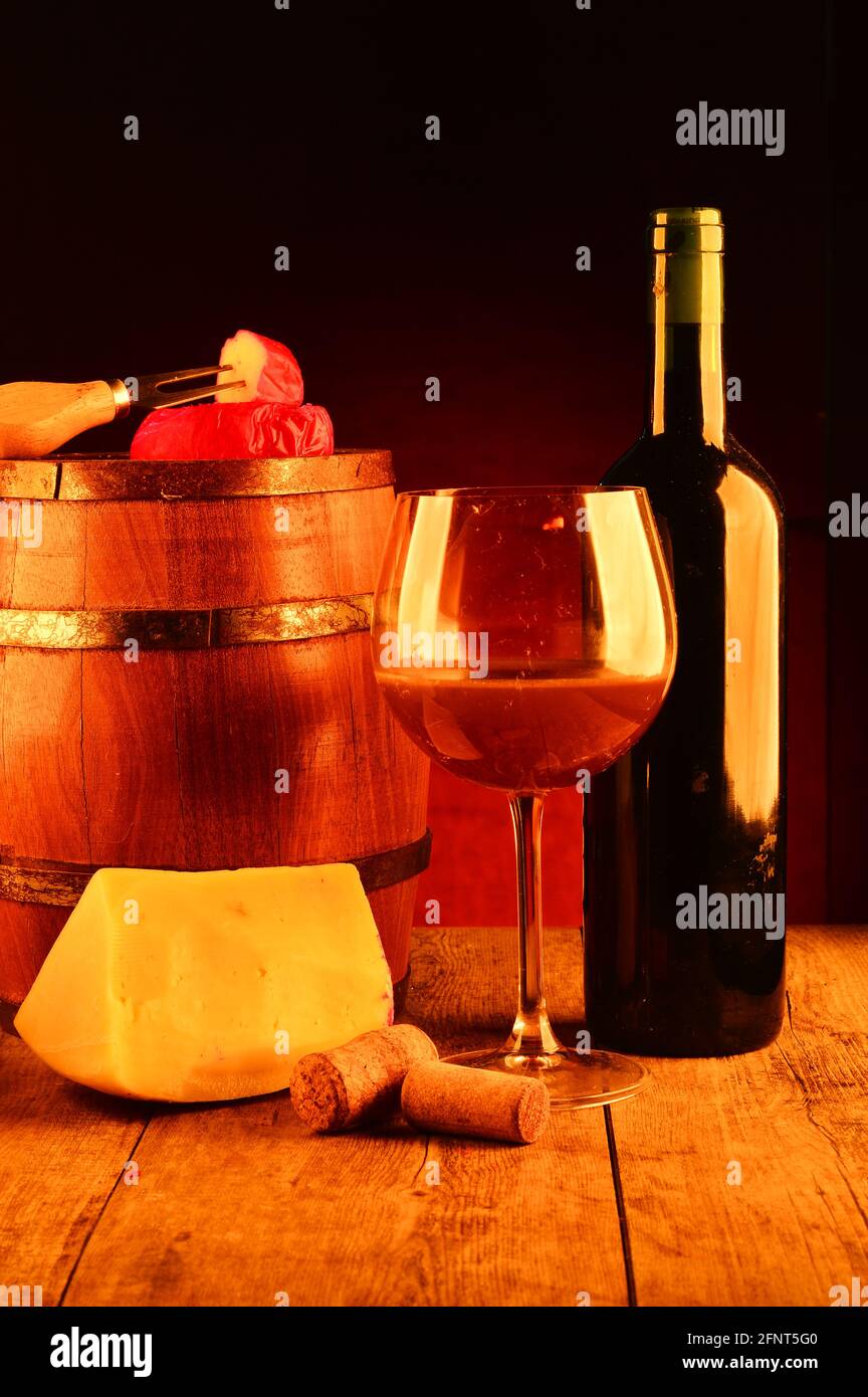 Glass and bottle of wine on the table Stock Photo - Alamy