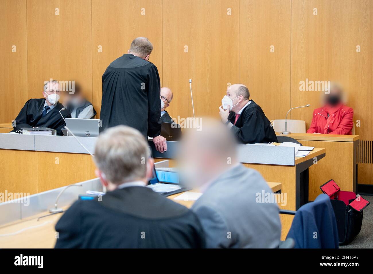 19 May 2021, Bavaria, Landshut: The three nursing staff members accused ...