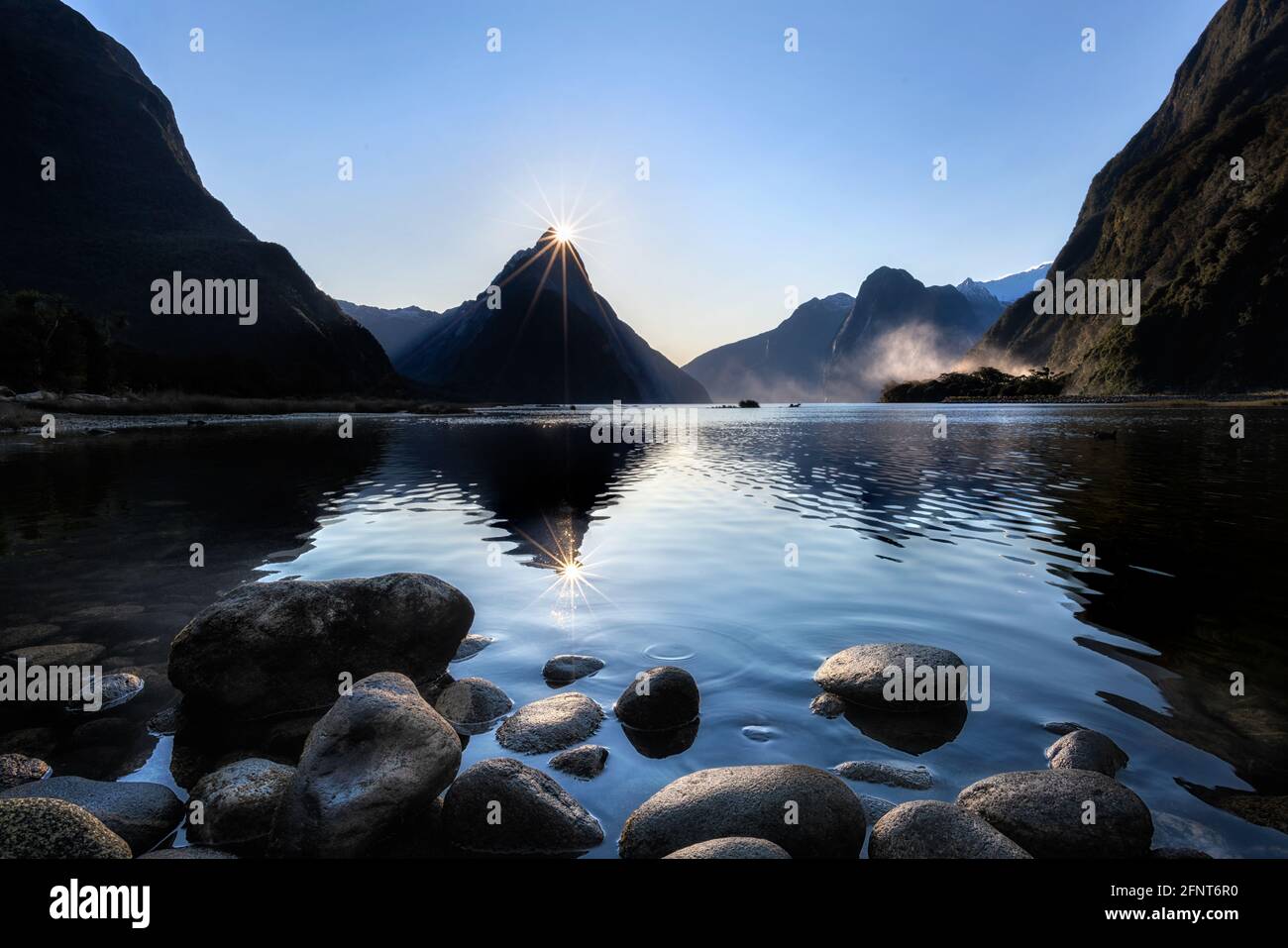 Sunset over Mitre Peak, Milford Sound Stock Photo - Alamy