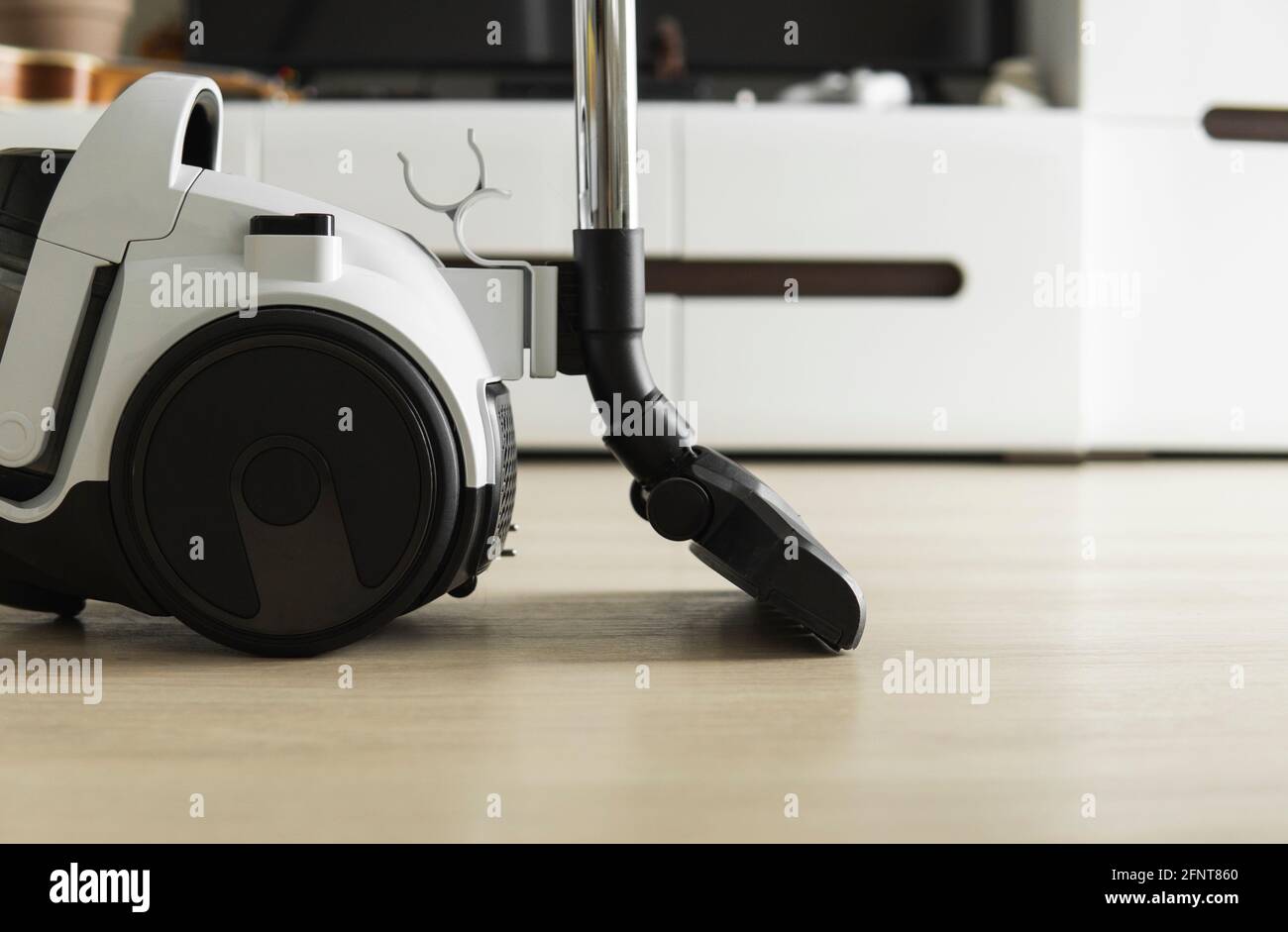 Bagless cyclone vacuum cleaner on a laminate. Electrical apparatus that ...