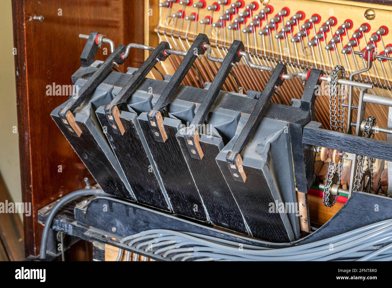 The reverse side of the five cylinder engine in a pianola Stock Photo ...