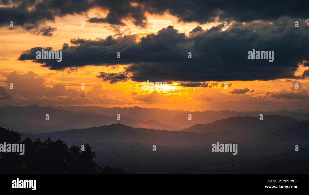 Sunset on the mountain in summer Golden hour Stock Photo - Alamy
