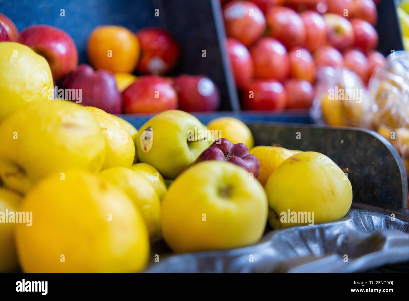 Close-up of colorful fruit stand with apples, and more Stock Photo - Alamy