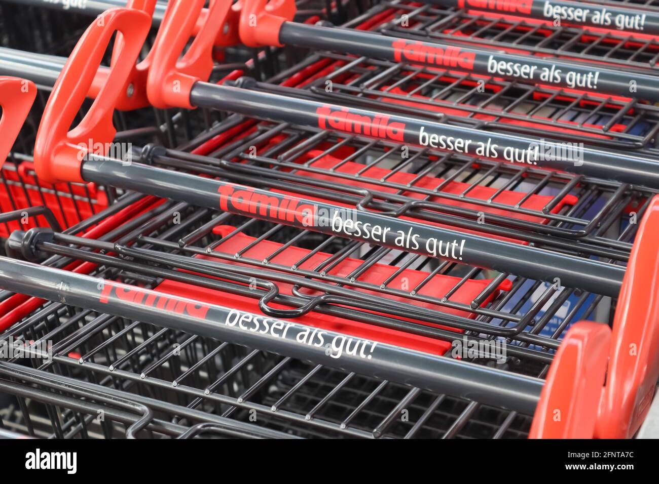 Shopping carts with the logo of Famila, a German discount store chain ...