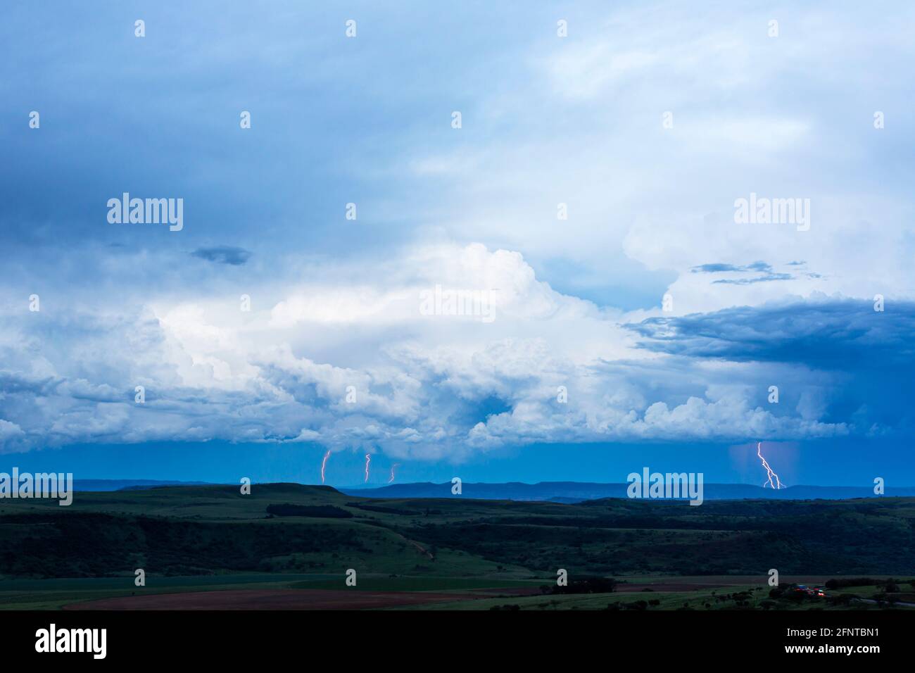 Lightning from clouds to ground Stock Photo - Alamy