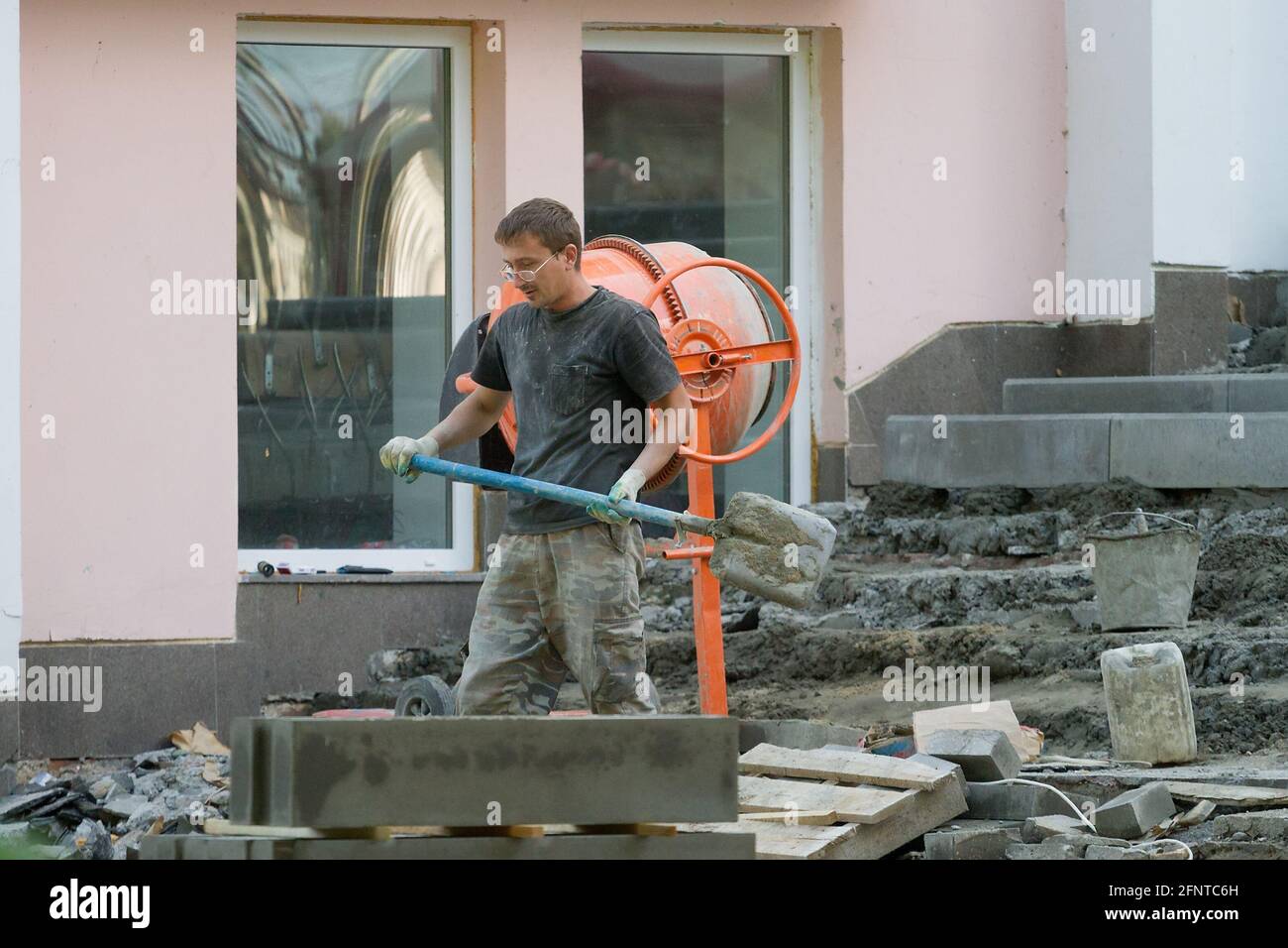 Russia. Moscow. Construction works. Concrete worker at a construction ...