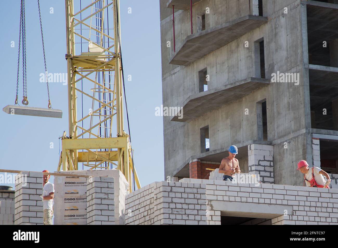 Russia. Moscow. Construction works. Workers at the construction of a ...