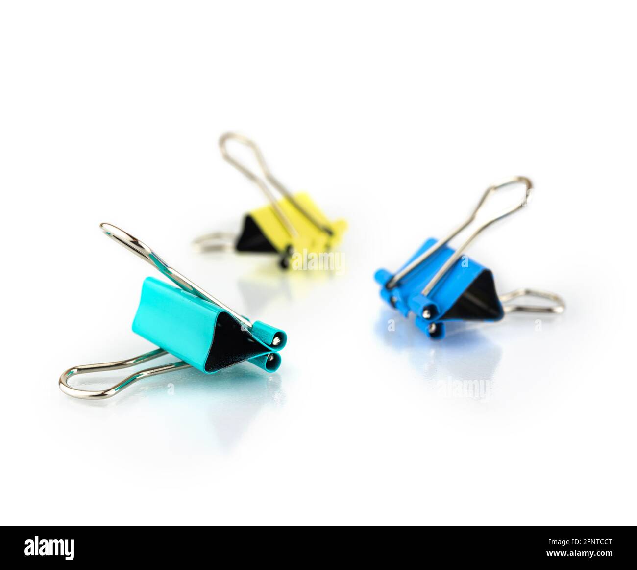 Three colorful paper clips binder isolated on white background with ...