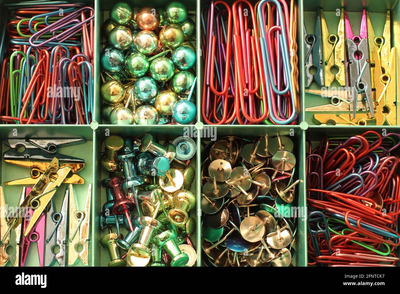 Stationery set. Paper clips, clothespins, push pins Stock Photo - Alamy