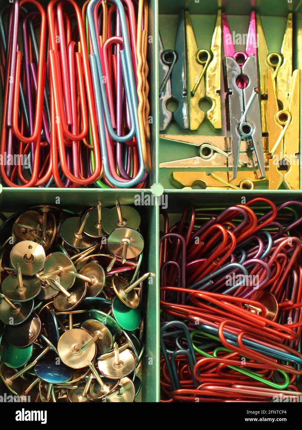 Stationery set. Paper clips, clothespins, push pins Stock Photo - Alamy